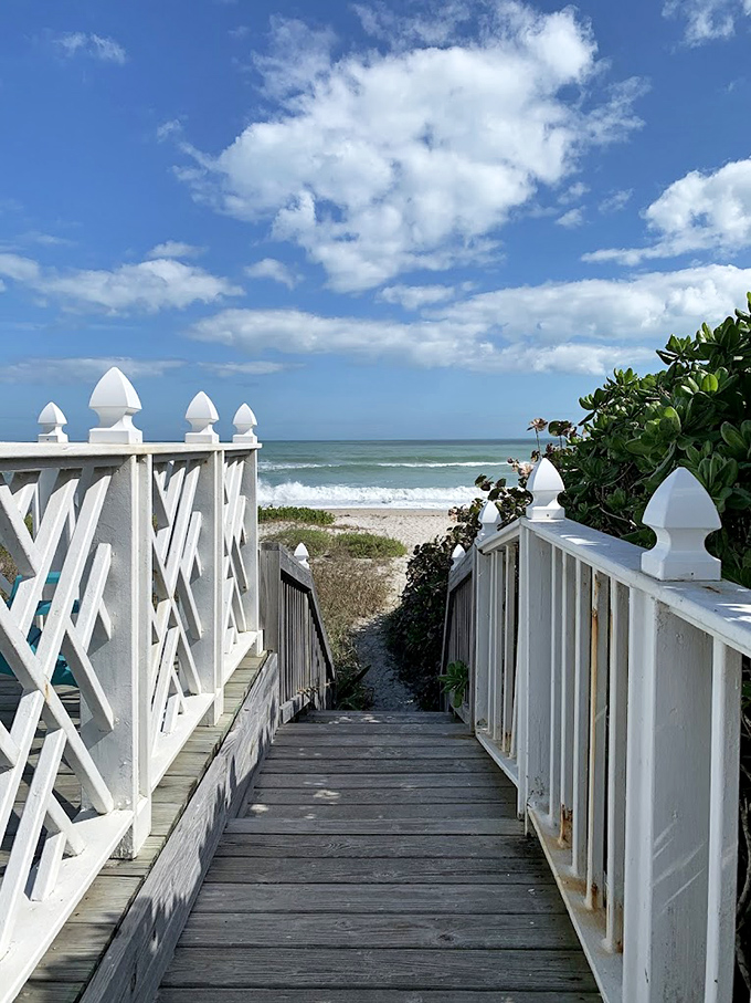 The white wooden walkway to the beach isn't just a path&mdash;it's a portal between everyday life and the rhythmic therapy of Atlantic waves.