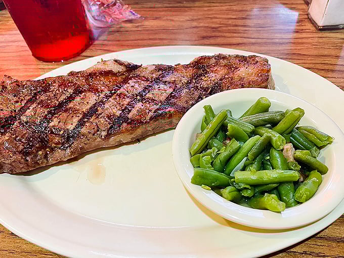 This perfectly grilled New York strip with green beans isn't just dinner&mdash;it's proof that simple food done right beats fancy any day.