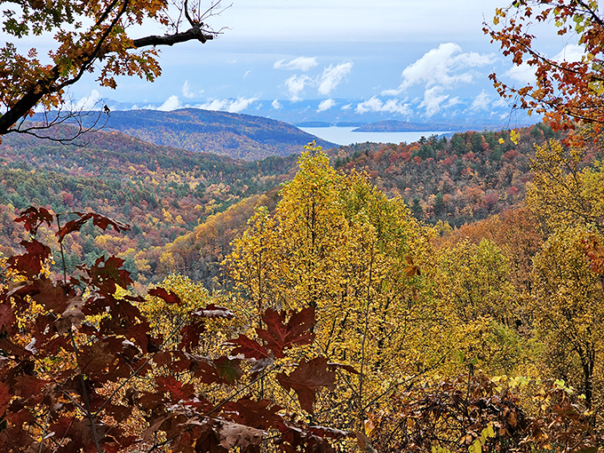 Fall foliage transforms the mountains into nature's patchwork quilt&mdash;reds, golds and greens creating a tapestry that no human artist could match.