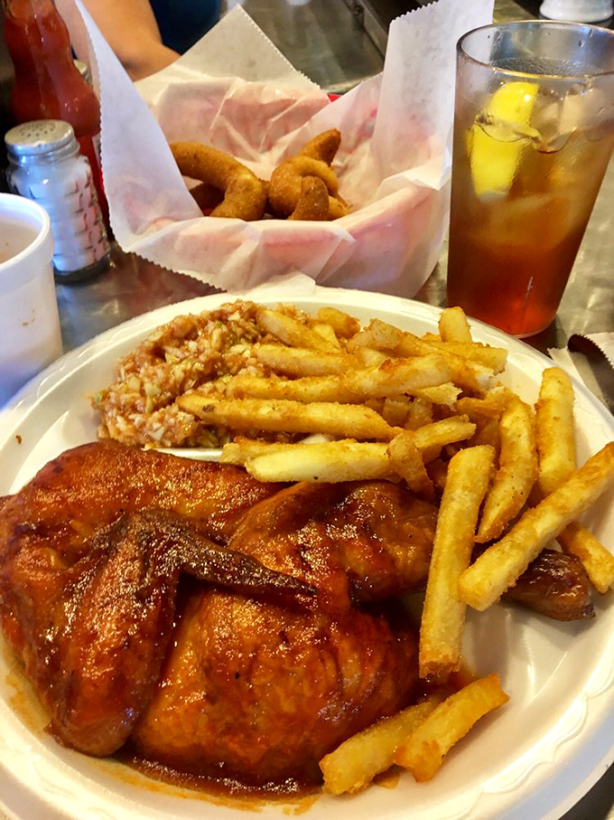 Barbecue chicken with that mahogany skin and tender meat proves that pork isn't the only thing they've mastered in those hickory pits.