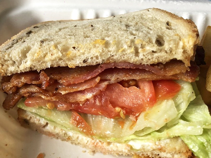 The close-up that launched a thousand road trips. This isn't just a sandwich&mdash;it's edible architecture with layers of flavor that would make Frank Lloyd Wright weep with joy.