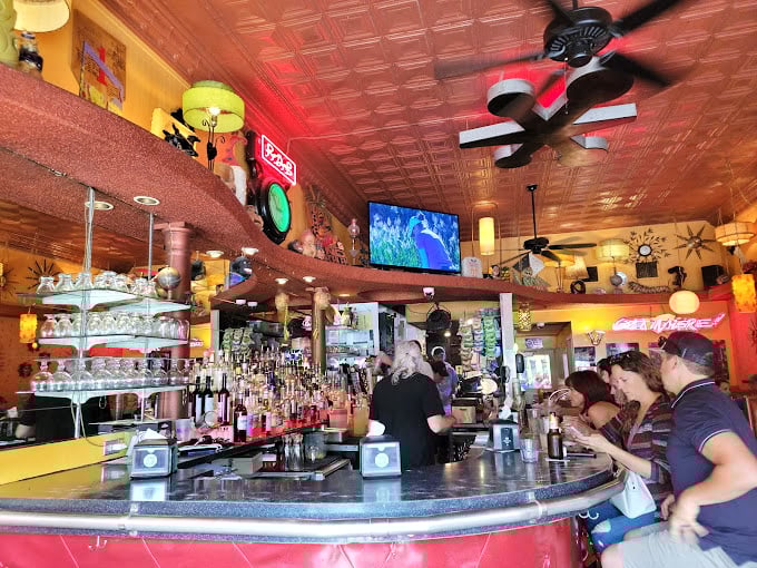 The bar doesn't just serve drinks&mdash;it offers a front-row seat to the sandwich symphony playing out behind the counter.