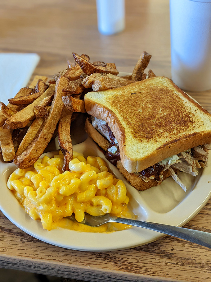 A sandwich that makes you question why you ever bothered with other food groups. Those fries and mac and cheese aren't sides&mdash;they're co-stars.