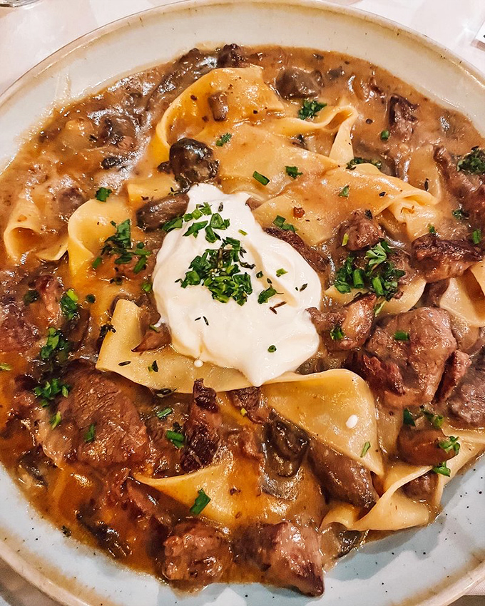 Beef Stroganoff elevated to art form&mdash;tender meat swimming in a sauce so rich it probably has its own accountant. Comfort food with a pedigree.