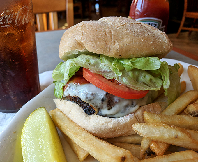 A burger that could make an Italian grandmother forgive you for not ordering pasta. Those fries are the supporting actors who steal the show.