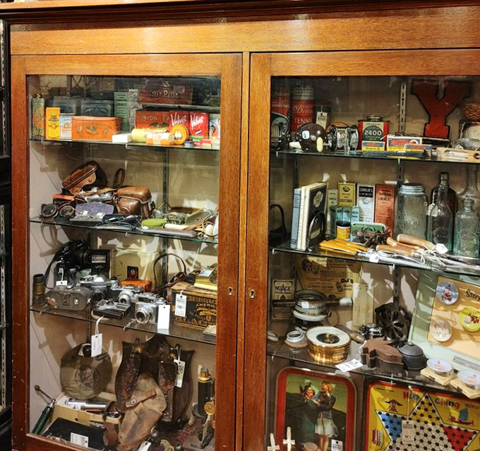 This display case doesn't just hold doorknobs&mdash;it cradles the first things countless hands touched before entering homes long forgotten.