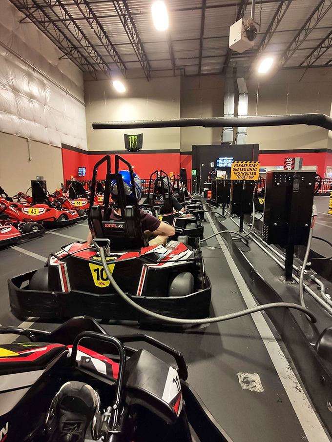 Lined up and ready for action, these electric karts hold the promise of temporary freedom from adulting. Zero emissions, maximum grins. 