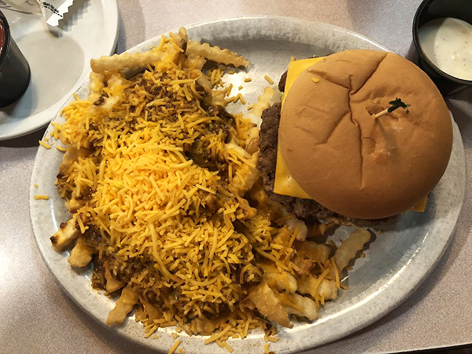 Chili cheese fries and a burger: the dynamic duo of diner delights that have saved more days than Batman and Robin.