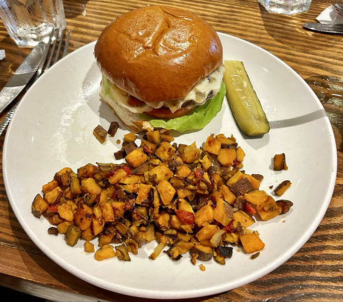 A burger that doesn't need a passport to take your taste buds on a world tour, with sweet potato hash that refuses to be just a sidekick.