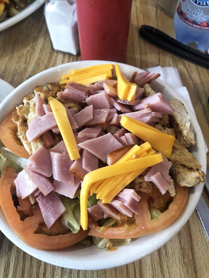 A chef's salad that actually satisfies, loaded with ham, cheese, and fresh vegetables. Proof that "eating light" doesn't mean going hungry.