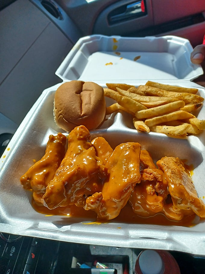 When wings come drenched in sauce this vibrant, napkins aren't optional &ndash; they're essential equipment for the delicious battle ahead.