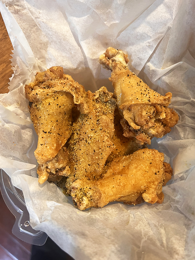 Golden-fried chicken wings that crunch like autumn leaves. Seasoned to perfection and ready for their close-up.