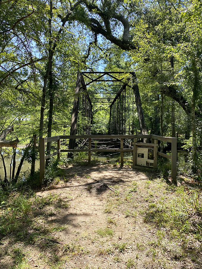 Standing sentinel since the early 1900s, the bridge now enjoys retirement from vehicular traffic. Its second career as a ghost host is going splendidly.