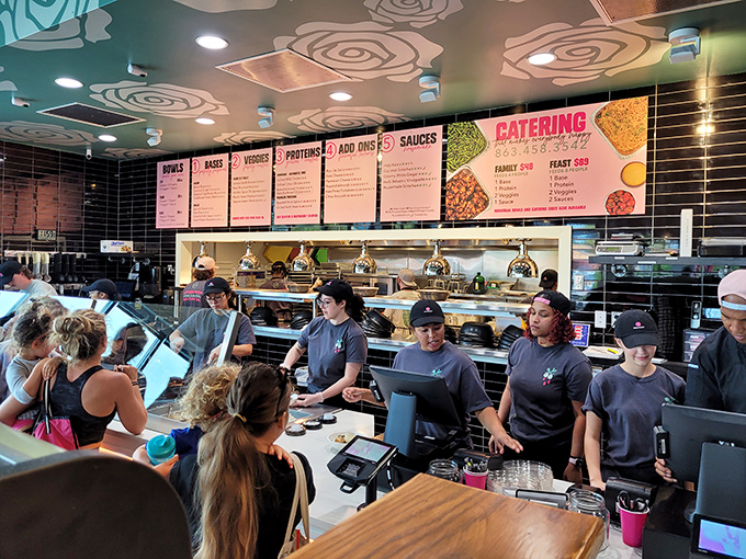 The assembly line of culinary wizards ready to build your perfect bowl&mdash;like NASA engineers but for your lunch satisfaction.