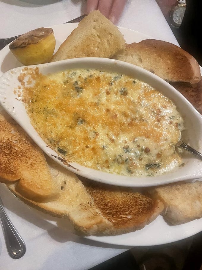 Bubbling cheese that doesn't just melt—it transforms. This dip has convinced more toast to take a swim than any lifeguard on duty.