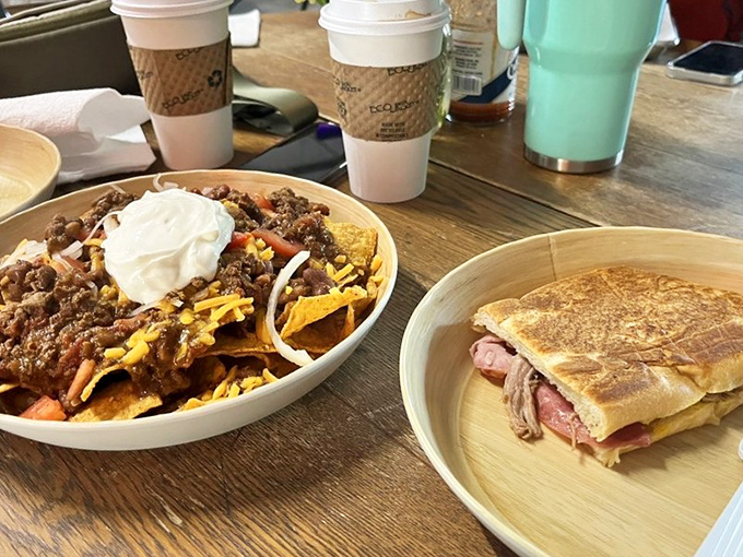 This Cuban sandwich and loaded nachos prove that sometimes the hardest choice in life is deciding which comfort food deserves your full attention first.