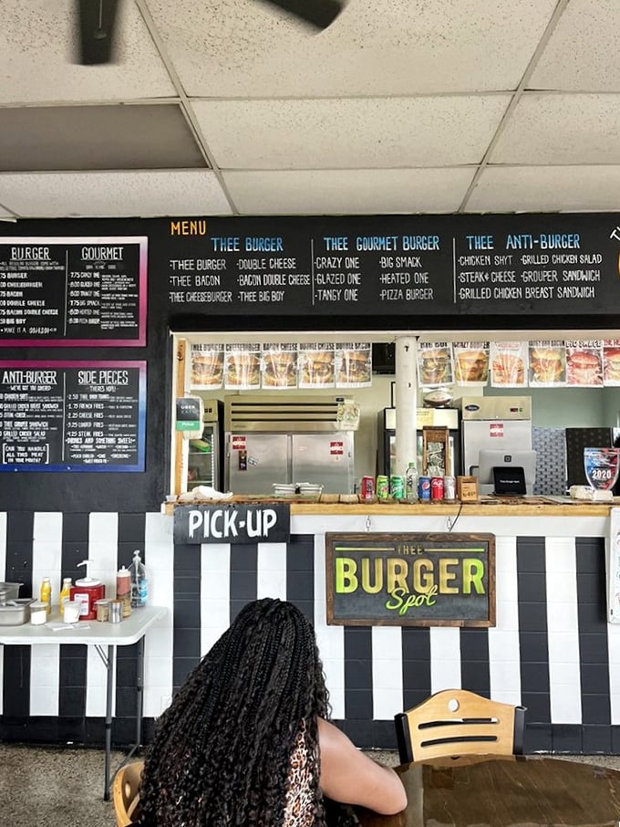 The anticipation is palpable as a customer contemplates the menu board's many promises. Decision-making has never been so delicious.