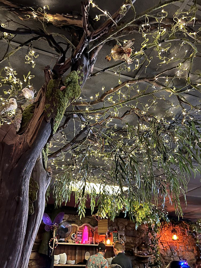 Not just branches and lights, but an entire enchanted tree that seems to have grown indoors specifically to watch over your meal.