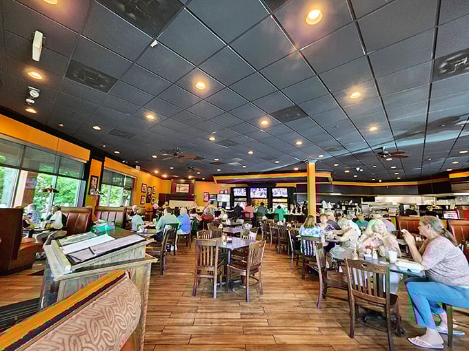 The bustling heart of West Cobb Diner, where strangers become neighbors over plates of comfort food. Notice how no table sits empty for long.