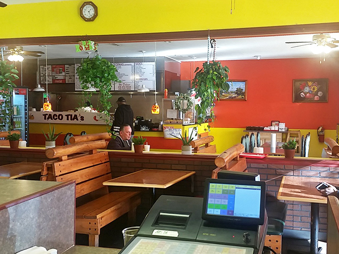 The restaurant's unpretentious interior invites lingering conversations and second helpings. Those wooden booths have witnessed countless food epiphanies.