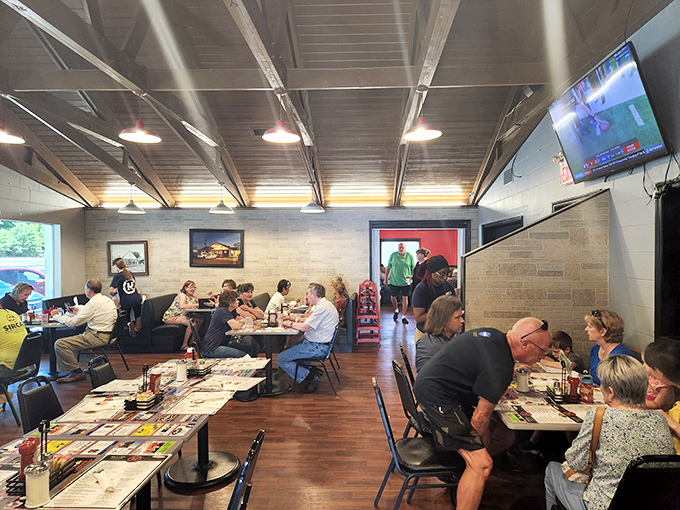 The dining room hums with the pleasant symphony of forks meeting plates and conversation flowing as freely as the coffee.