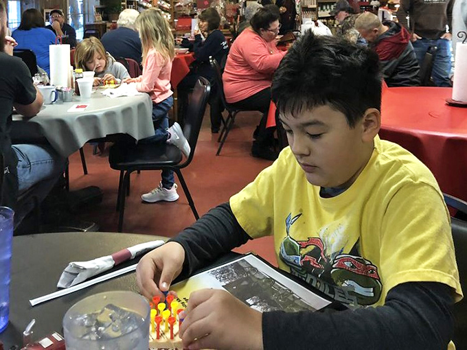The dining room hums with the universal language of good food. Even the kids put down their devices when the plates arrive.