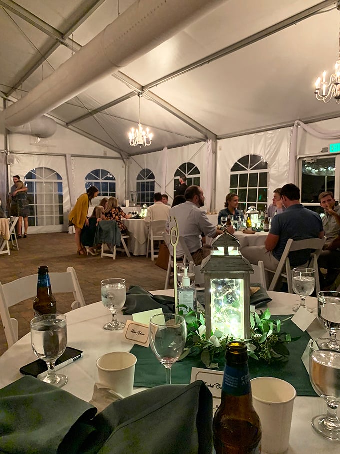 Special occasions happen under canvas too. This elegant tent setting transforms outdoor dining into an experience worthy of life's milestone moments.