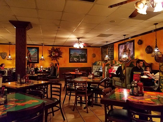 The dining room buzzes with the universal language of satisfied customers. Notice nobody's looking at their phones&mdash;the food has their full attention.