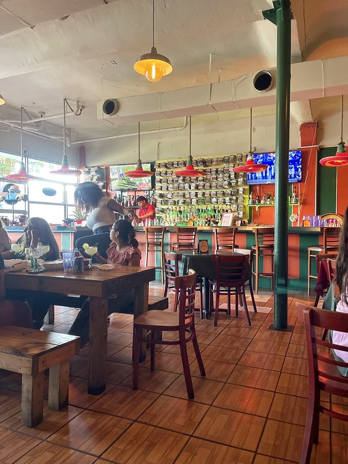 The dining room buzzes with the universal language of "mmm" as strangers become temporary family, united by exceptional Mexican cuisine.