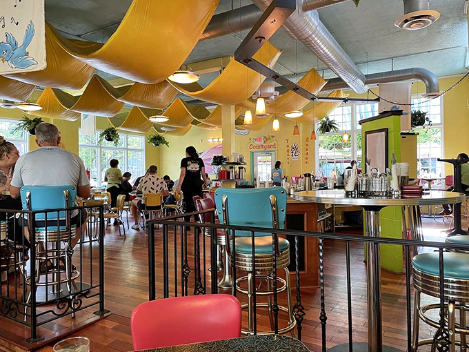 Sunshine-yellow walls, vintage-style furniture, and the unmistakable buzz of happy diners. This isn't just eating &ndash; it's time travel with hash browns.