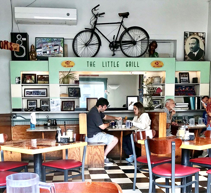 The bicycle mounted above the pass-through window isn't just decoration&mdash;it's a reminder that the best journeys often lead to unexpected places.