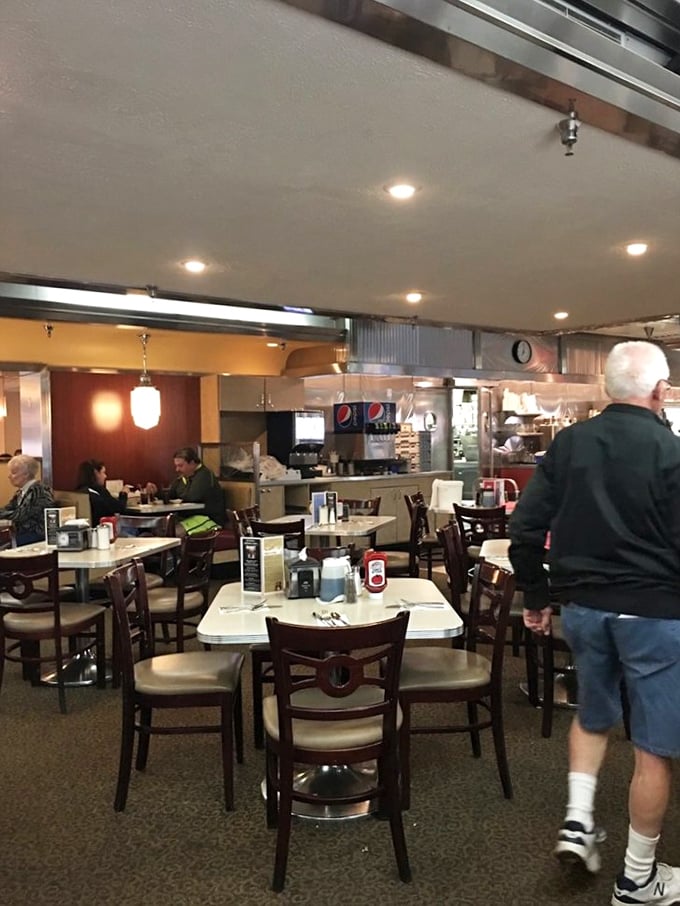 The counter seating&mdash;where solo diners become temporary family and the coffee keeps flowing like conversation between old friends.