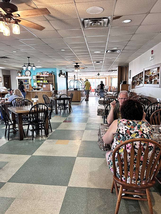 The dining room hums with the universal language of good food, where strangers become friends united by gravy and satisfaction.