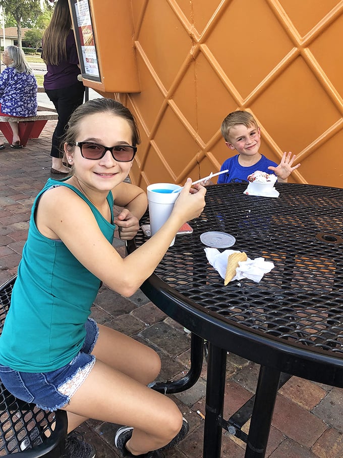 The joy of ice cream knows no age limits. Blue slushies make excellent photographers' props and even better tongue-coloring devices.