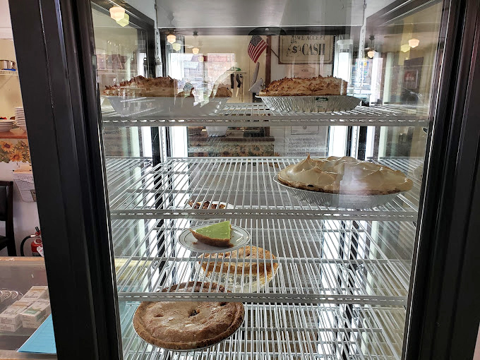 The pie display case&mdash;where life-changing decisions are made daily and "I'll just have a small slice" becomes the lie we tell ourselves.