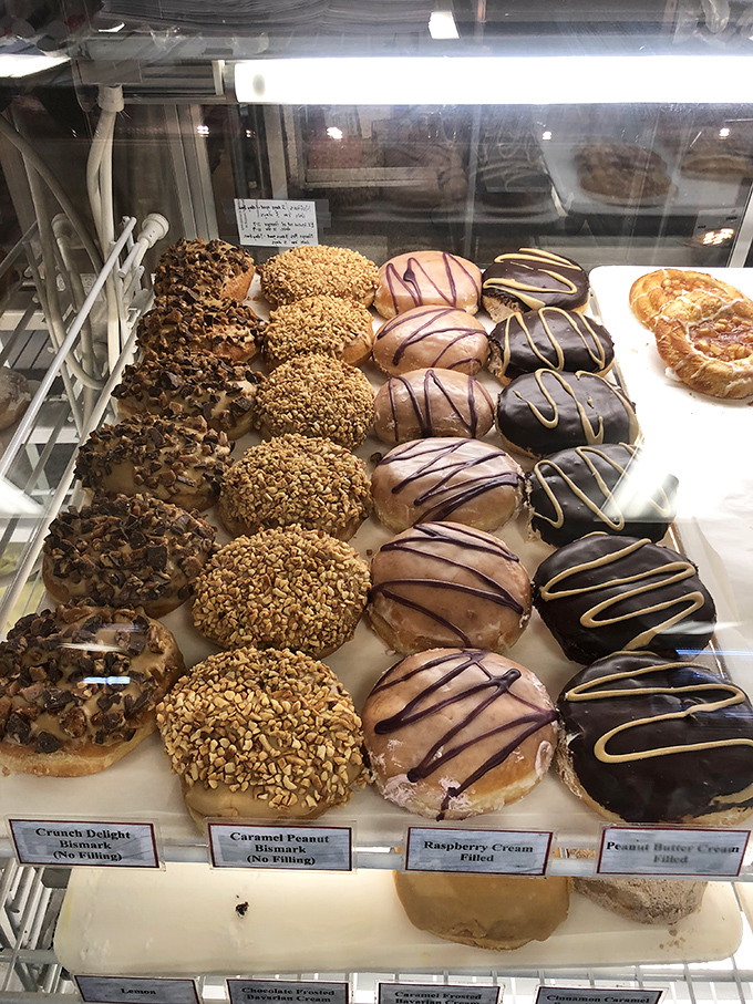 The donut display case&mdash;where adult decision-making skills go to die and the phrase "I'll take one of each" was surely invented.
