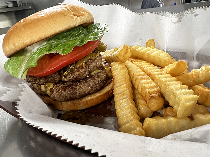 A burger that requires both hands, a stack of napkins, and absolutely no first-date nerves&mdash;pure, unapologetic deliciousness.