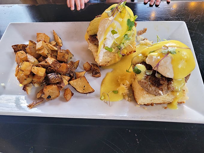 Eggs Benedict that would make breakfast skeptics set their alarms early. Golden hollandaise cascades like a sunrise over perfectly poached eggs.