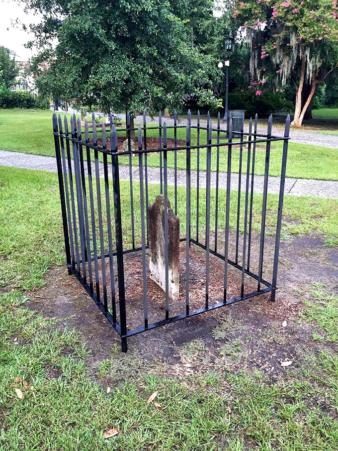 This solitary tombstone earned its own iron cage&mdash;either to protect it from vandals or to keep whatever's buried there from getting out.