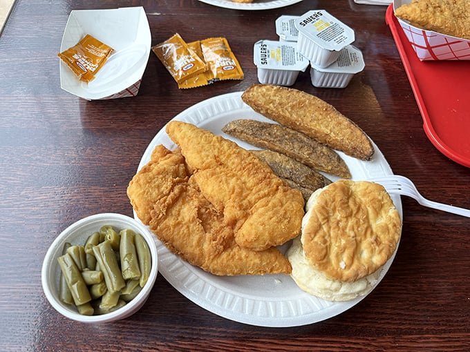 The fish looks like it jumped straight from the water into a perfect bath of batter, accompanied by green beans that grandma would approve of.