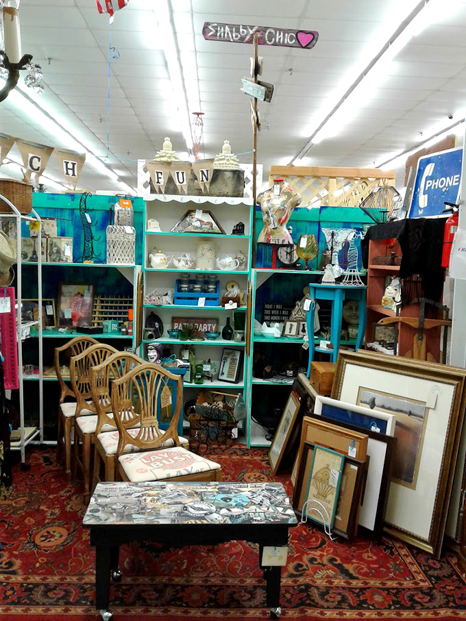 A turquoise oasis of "Shabby Chic" decor where vintage chairs invite you to sit and contemplate whether your living room needs more character.