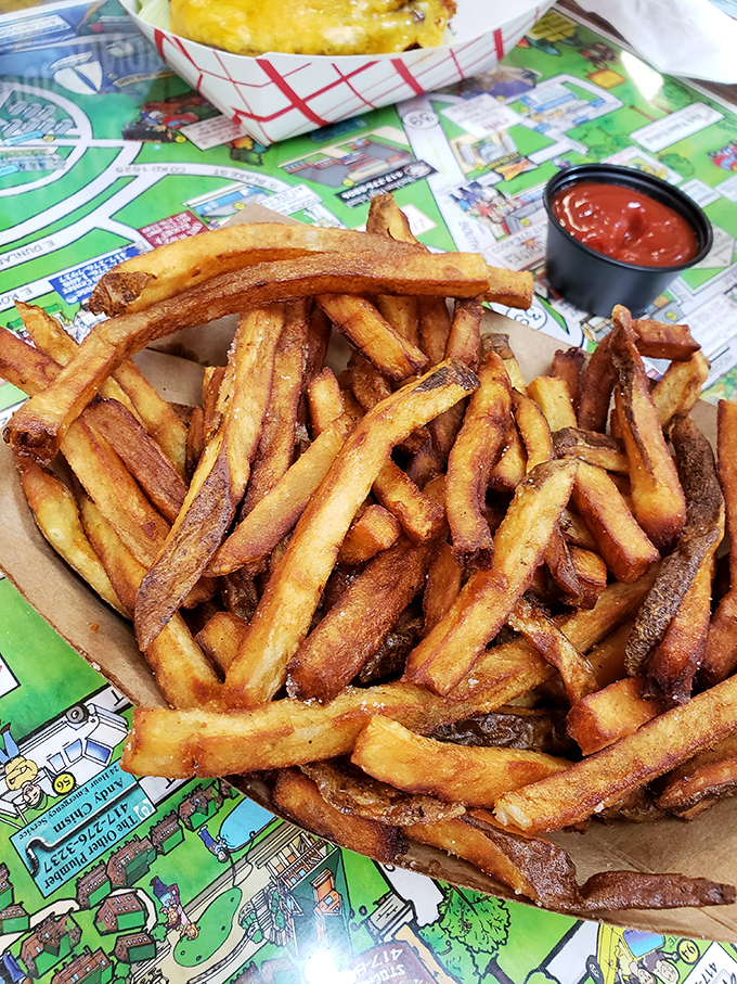 These aren't just french fries&mdash;they're golden wands of potato perfection, hand-cut daily and fried until they achieve that perfect crisp-outside, fluffy-inside balance.