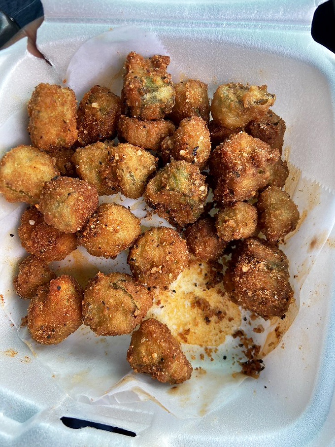 Fried okra: the South's answer to popcorn. These golden nuggets provide the perfect crunchy counterpoint to all that tender meat.