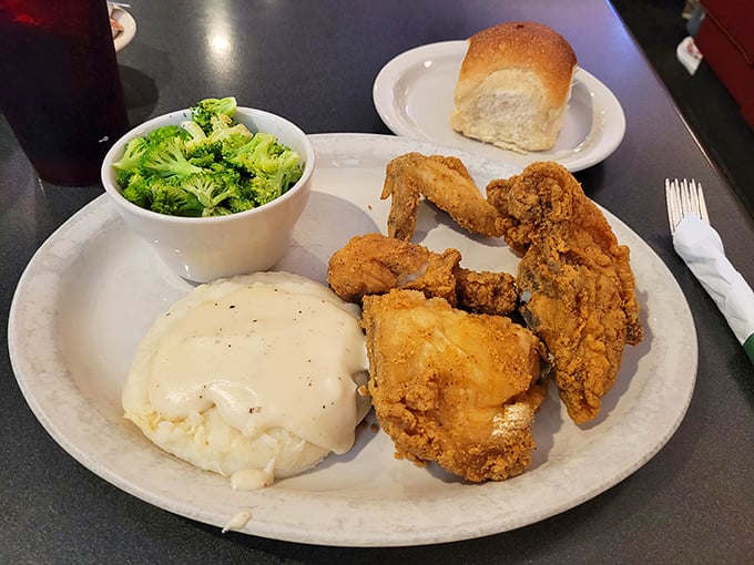 Fried chicken that achieves that mythical balance of crunch and tenderness, with sides that don't consider themselves mere accessories but co-stars.