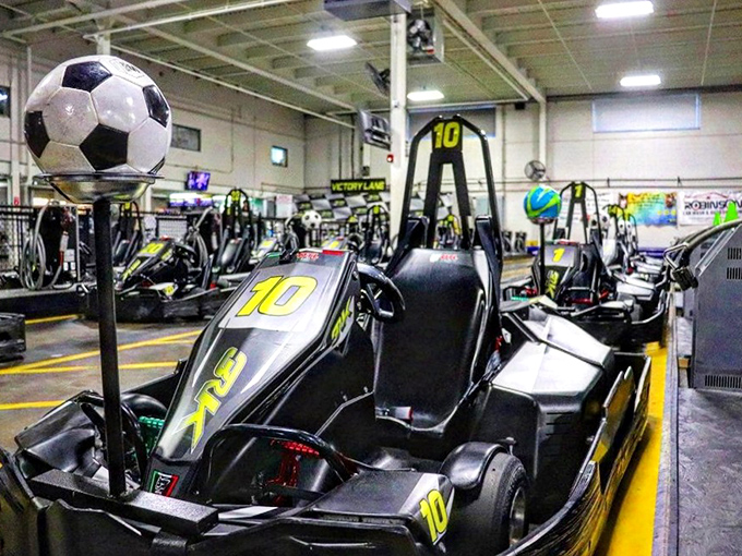 Staff members guide young racers through their first laps. That gentle push is the beginning of a lifelong need for speed.