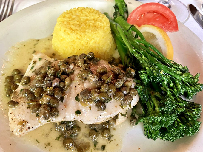 Halibut with capers and lemon&mdash;proof that simplicity, when executed perfectly, beats complexity every time. Those asparagus spears are just showing off. 