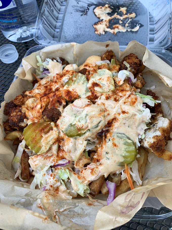 These hot chicken tenders over fries aren't just a meal—they're what comfort food dreams are made of after a long day.