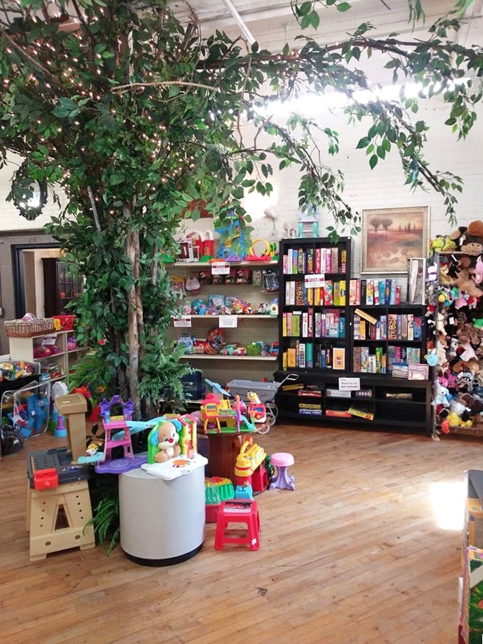 Childhood magic grows here. Artificial trees create a whimsical canopy over toys and games, transforming shopping into an enchanted forest adventure.