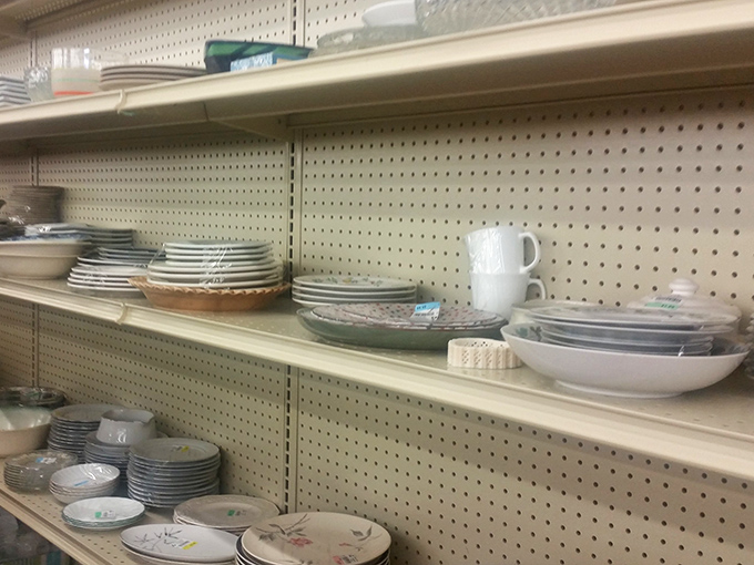 Dish department dreams come true on these pegboard shelves. Mismatched plates aren't just tableware&mdash;they're the start of your "eclectic host with the most" reputation.