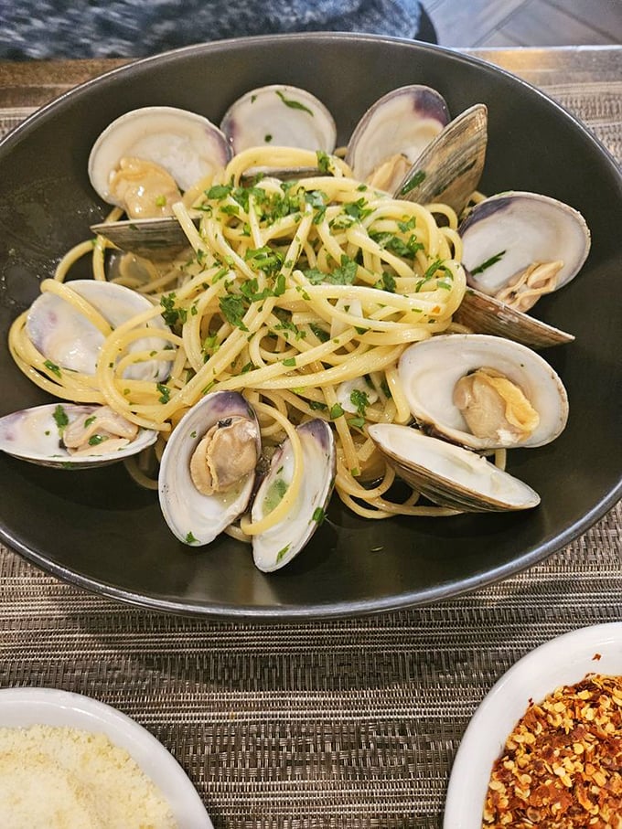 Linguine with clams&mdash;where pasta meets the sea in a beautiful friendship. Those open shells are nature's way of applauding the chef.